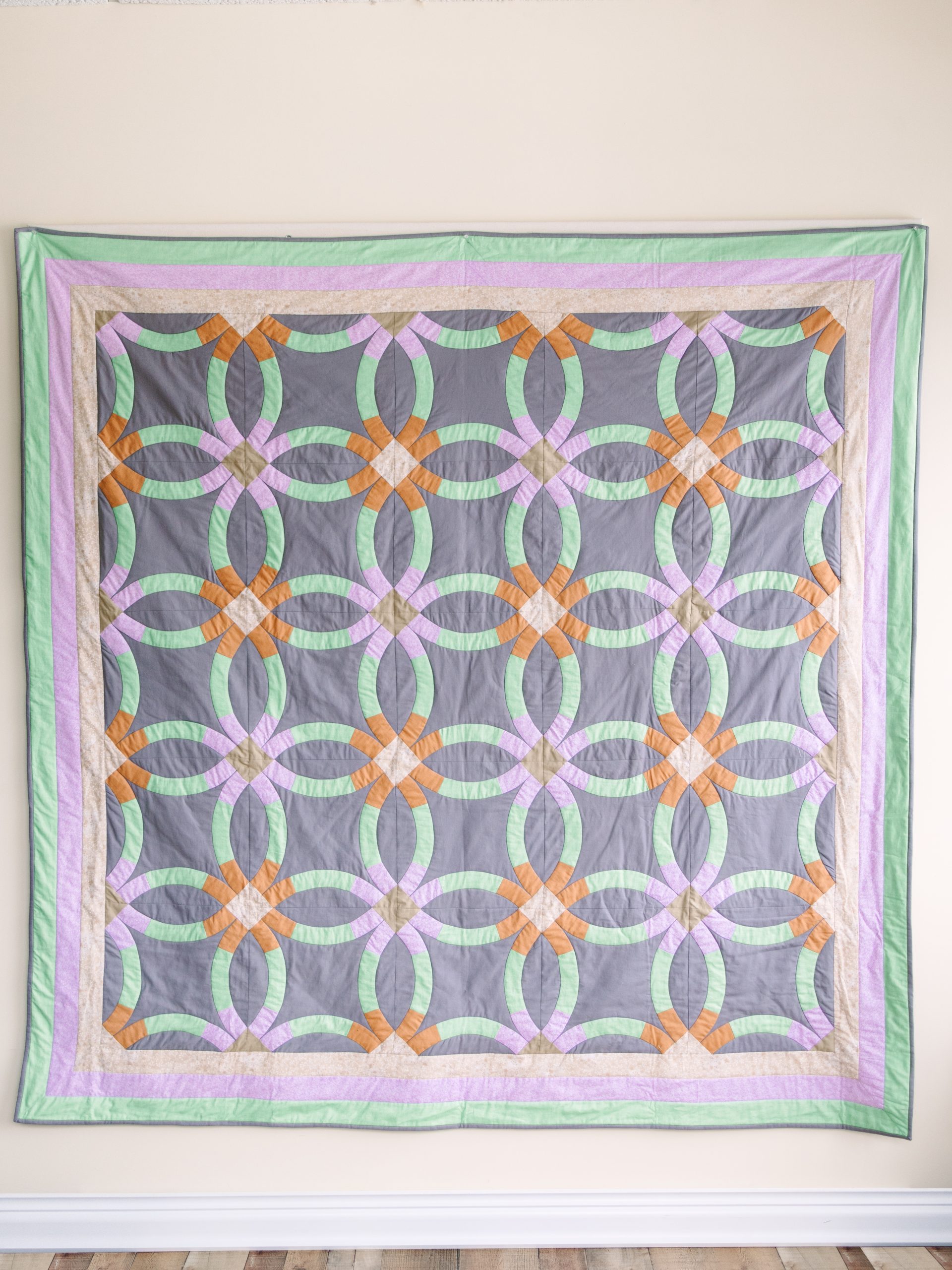 Opal Evening Double Wedding Ring Quilt Pattern - We Like Quilting